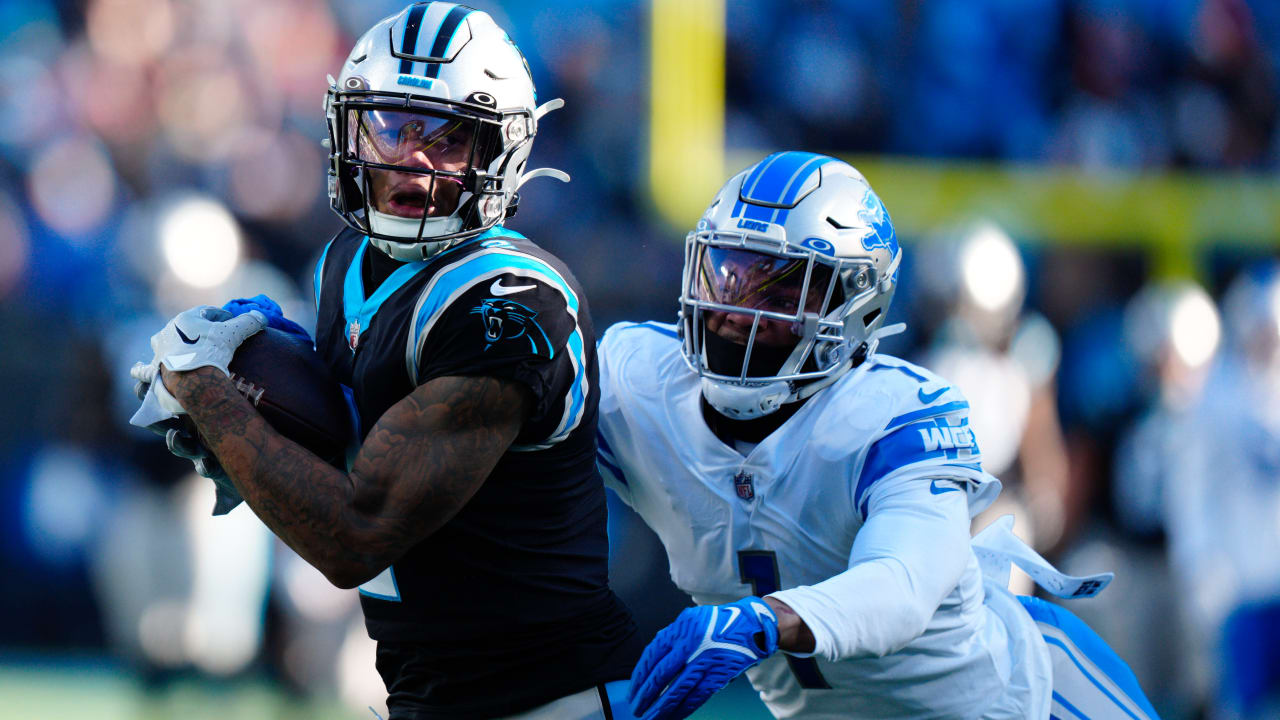 Carolina Panthers quarterback Sam Darnold dots Panthers wide receiver D ...