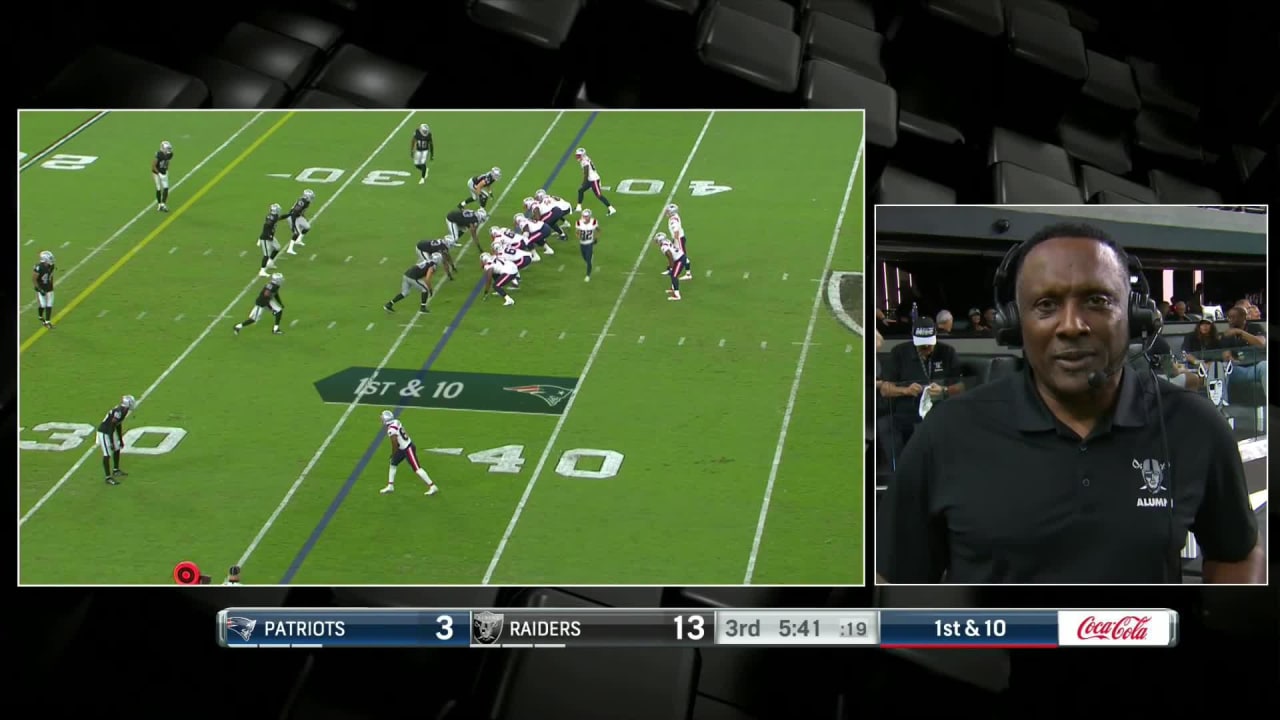 New England Patriots running back Kevin Harris breaks through the line ...