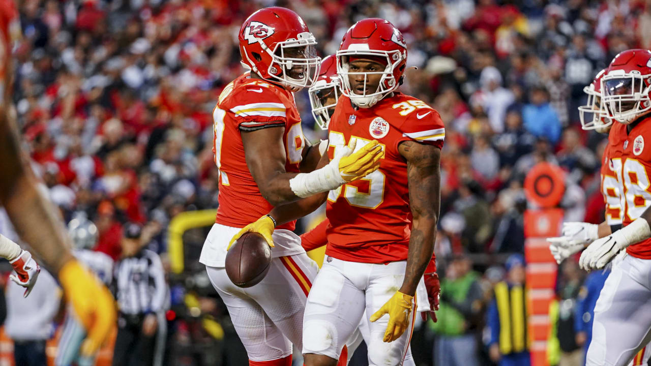 Kansas City Chiefs cornerback Charvarius Ward goes soaring to intercept ...