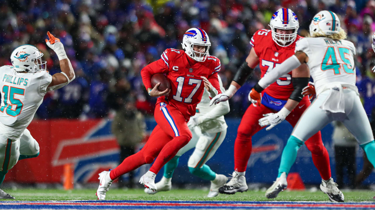 Buffalo Bills quarterback Josh Allen takes off for a 13-yard gain