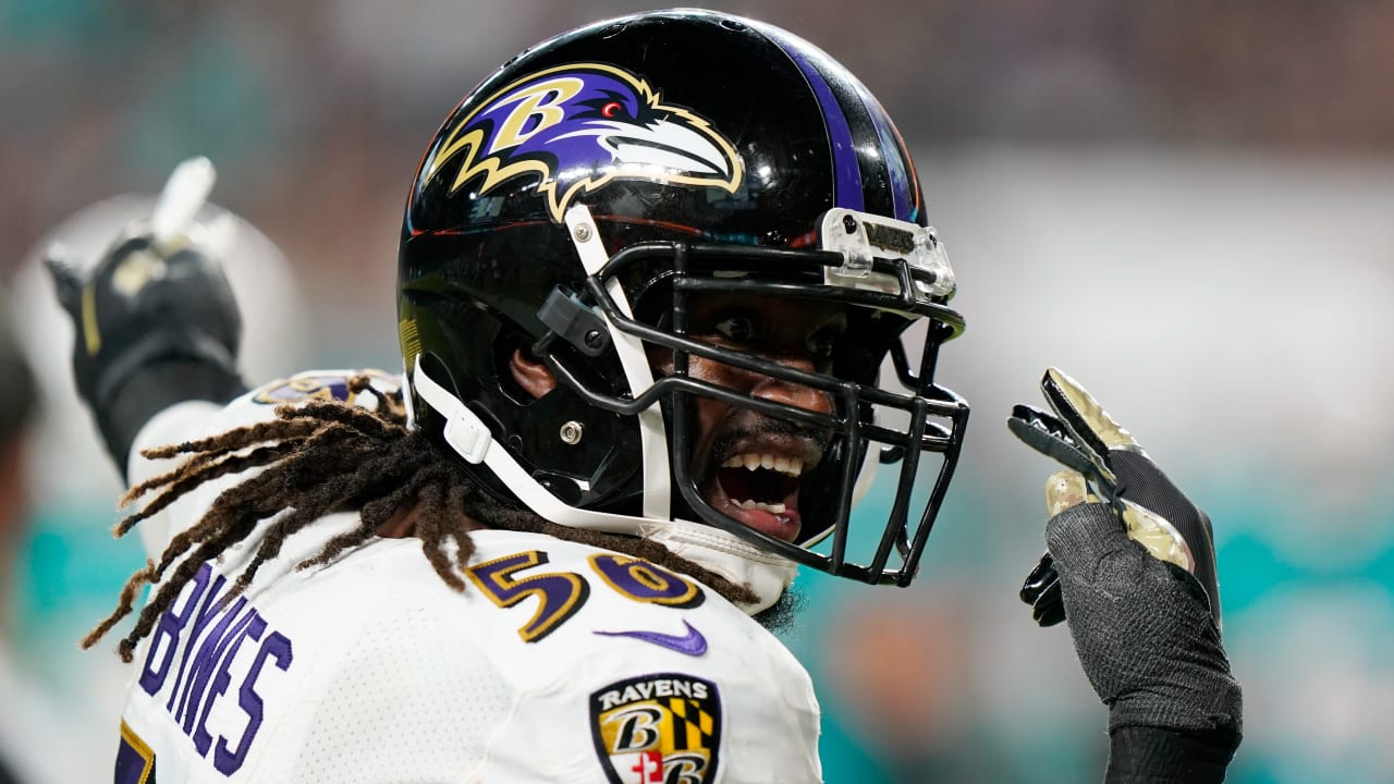 Baltimore Ravens linebacker Josh Bynes looks like Jumpman logo reaching ...