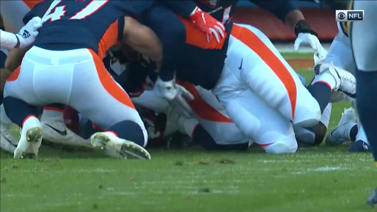 Broncos win scrum for the football after Bolts muff the punt