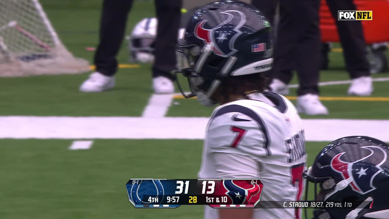 Houston Texans wide receiver Tank Dell slips past would-be tackler to ...