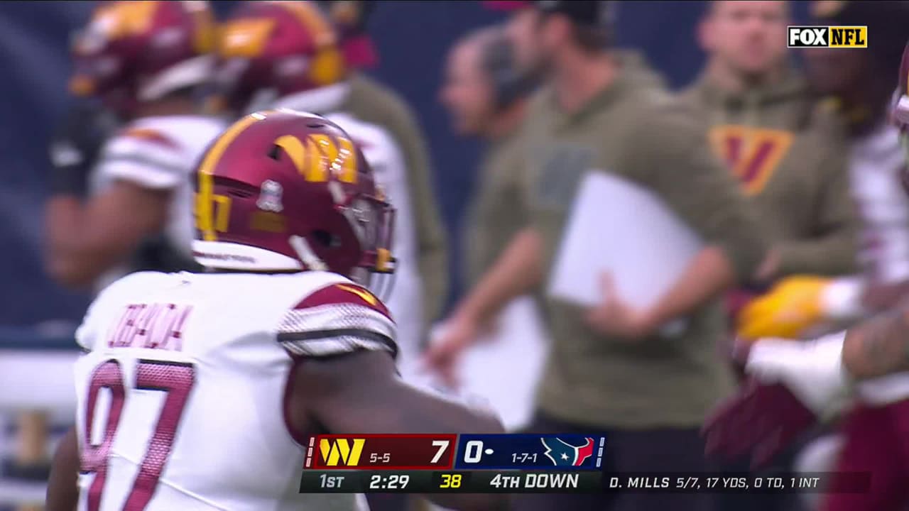 Washington Commanders defensive end Efe Obada plows Houston Texans ...