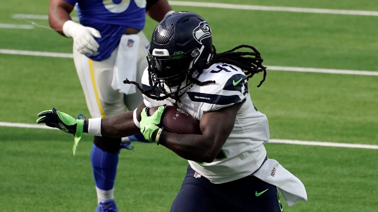 Seattle Seahawks running back Alex Collins dashes for his first ...