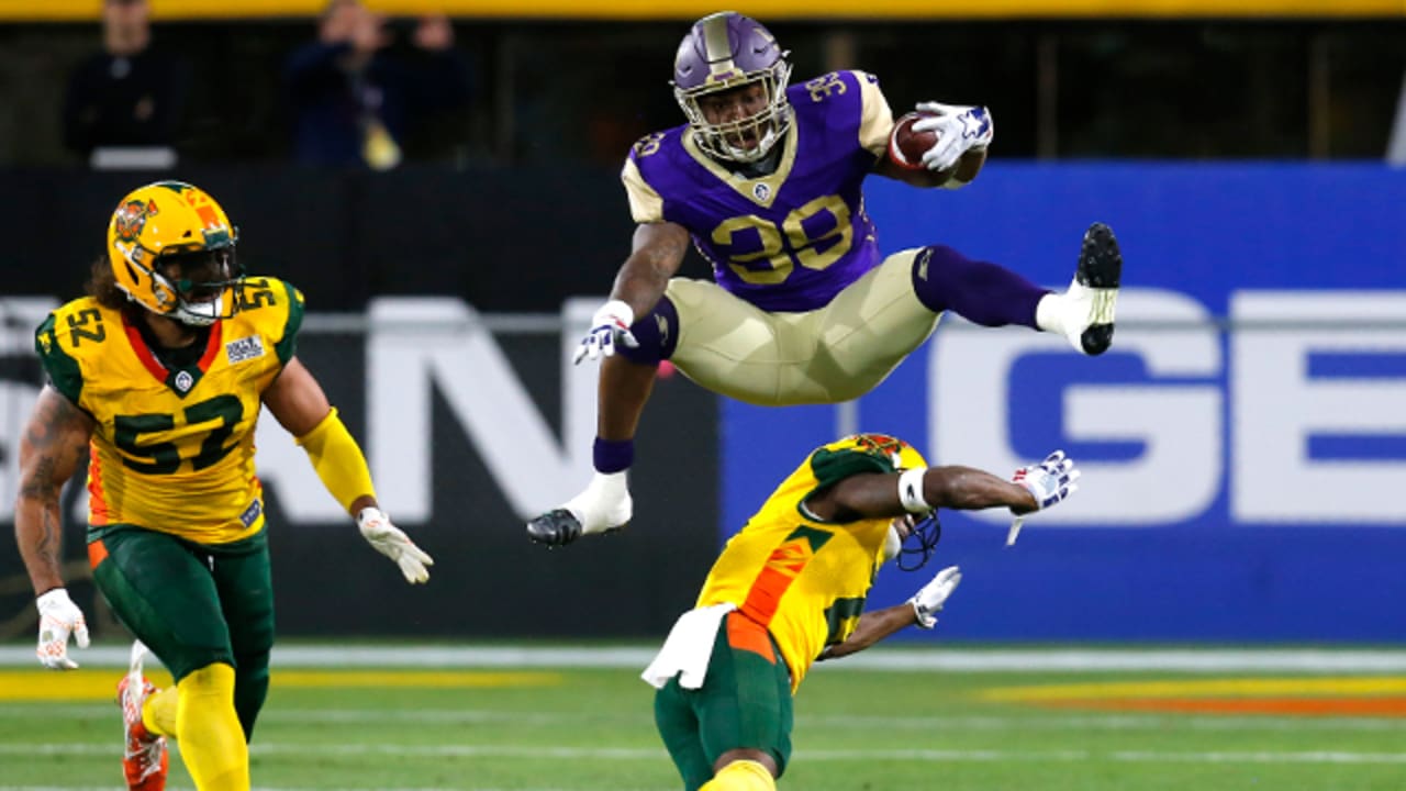 Brandon Radcliff leaps over defender to cap off a 14-yard run