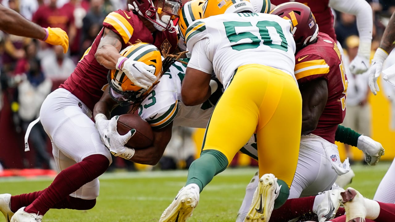 Green Bay Packers running back Aaron Jones powers through defenders for ...