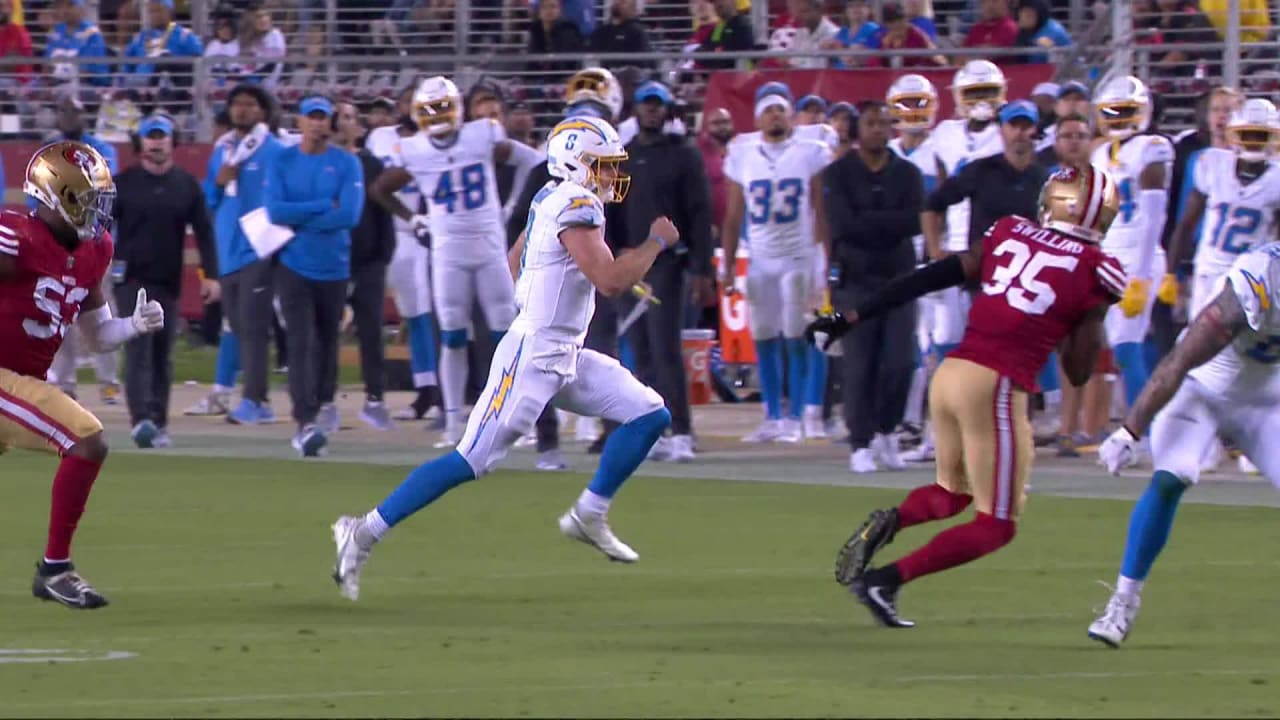 Los Angeles Chargers quarterback Max Duggan takes the zone-read keeper ...