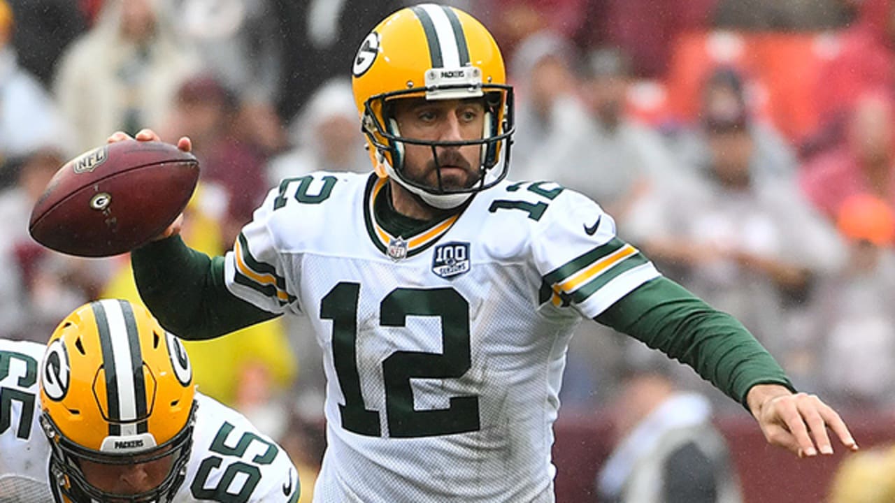 Rodgers throws a dart mid-tackle to Allison for first down