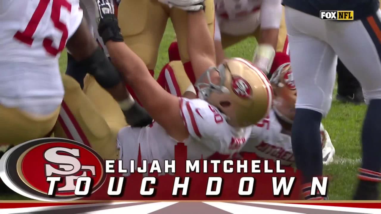 San Francisco 49ers Elijah Mitchell carries pile of defenders for go ...