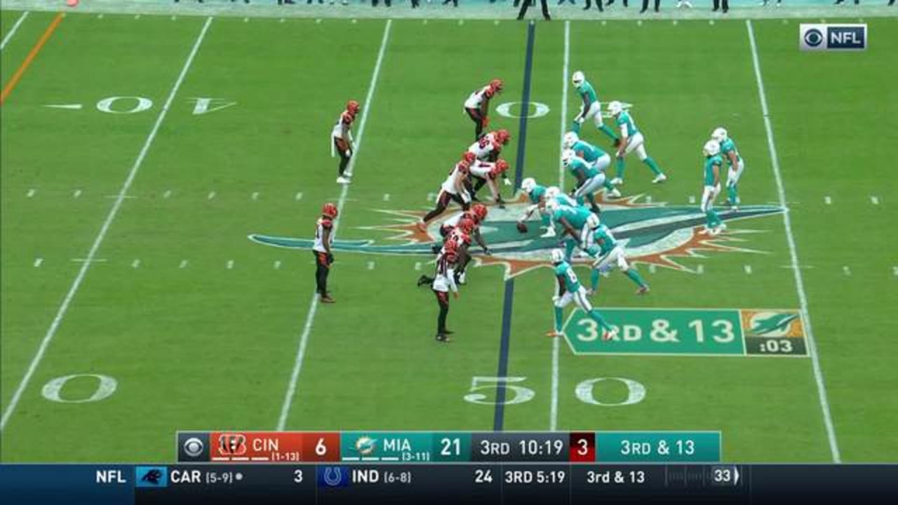 Isaiah Ford makes contested grab amid two defenders