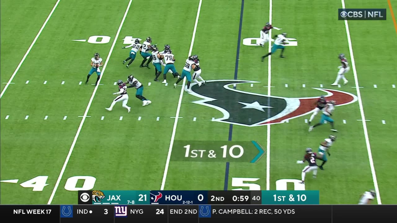 Houston Texans defensive end Ogbo Okoronkwo gets to Trevor Lawrence for ...