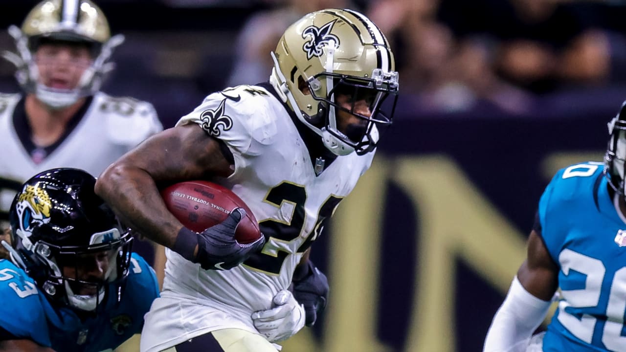 New Orleans Saints running back Dwayne Washington rumbles down the ...