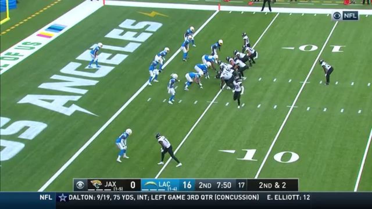 Jacksonville Jaguars running back James Robinson reaches ball over the ...