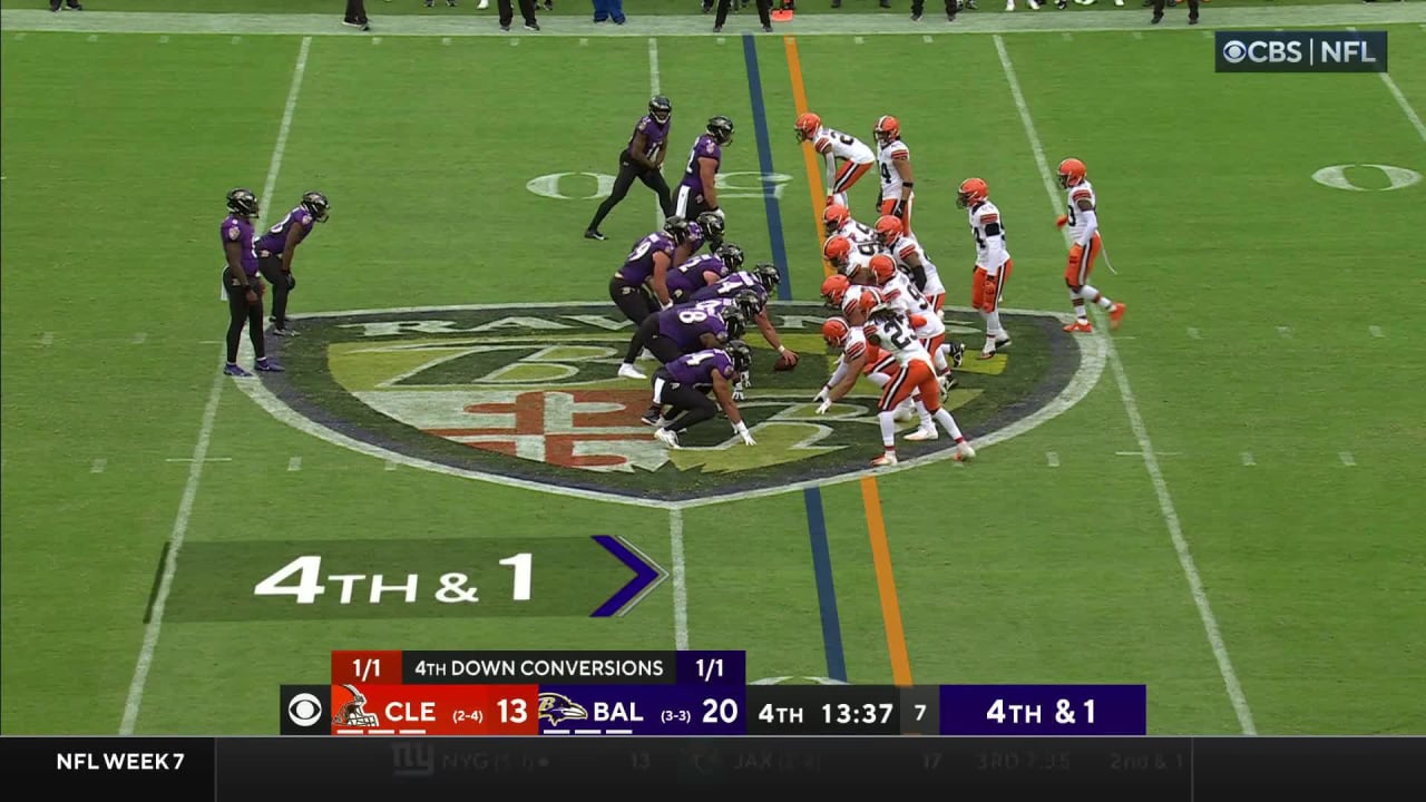 Baltimore Ravens quarterback Lamar Jackson converts fourth down with ...