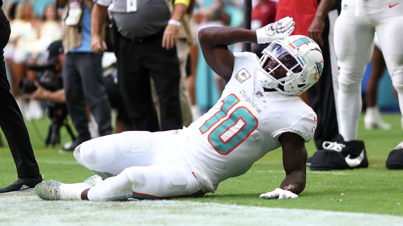 Miami Dolphins perform CPR celebration on wide receiver Tyreek Hill after WR's TD catch