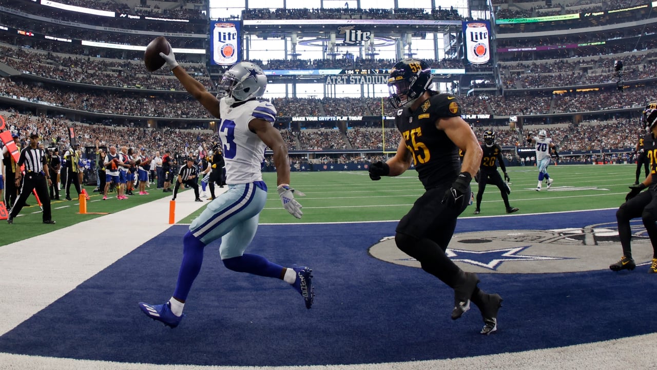 Dallas Cowboys quarterback Cooper Rush hits a racing wide receiver ...