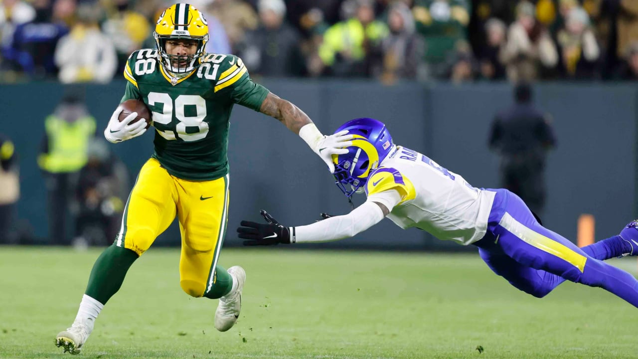 Green Bay Packers running back AJ Dillon punches in his second TD on a ...