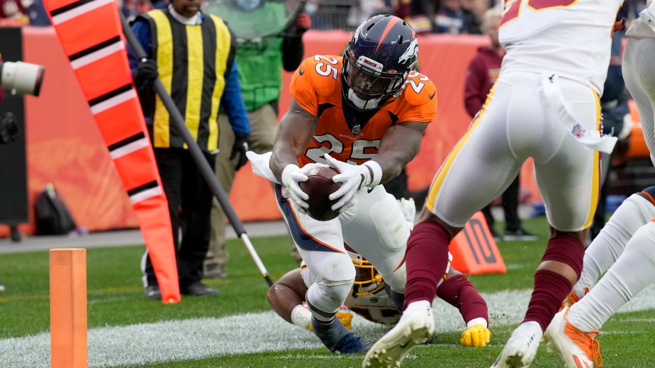 Denver Broncos running back Melvin Gordon looks for the pylon on a 15 ...