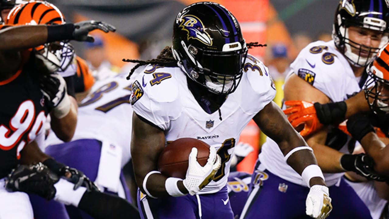 Lamar Jackson hands off to Collins for 14-yard gain