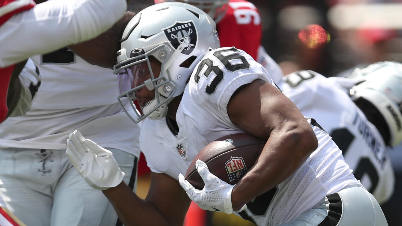 Las Vegas Raiders running back Trey Ragas puts a move on San Francisco ...