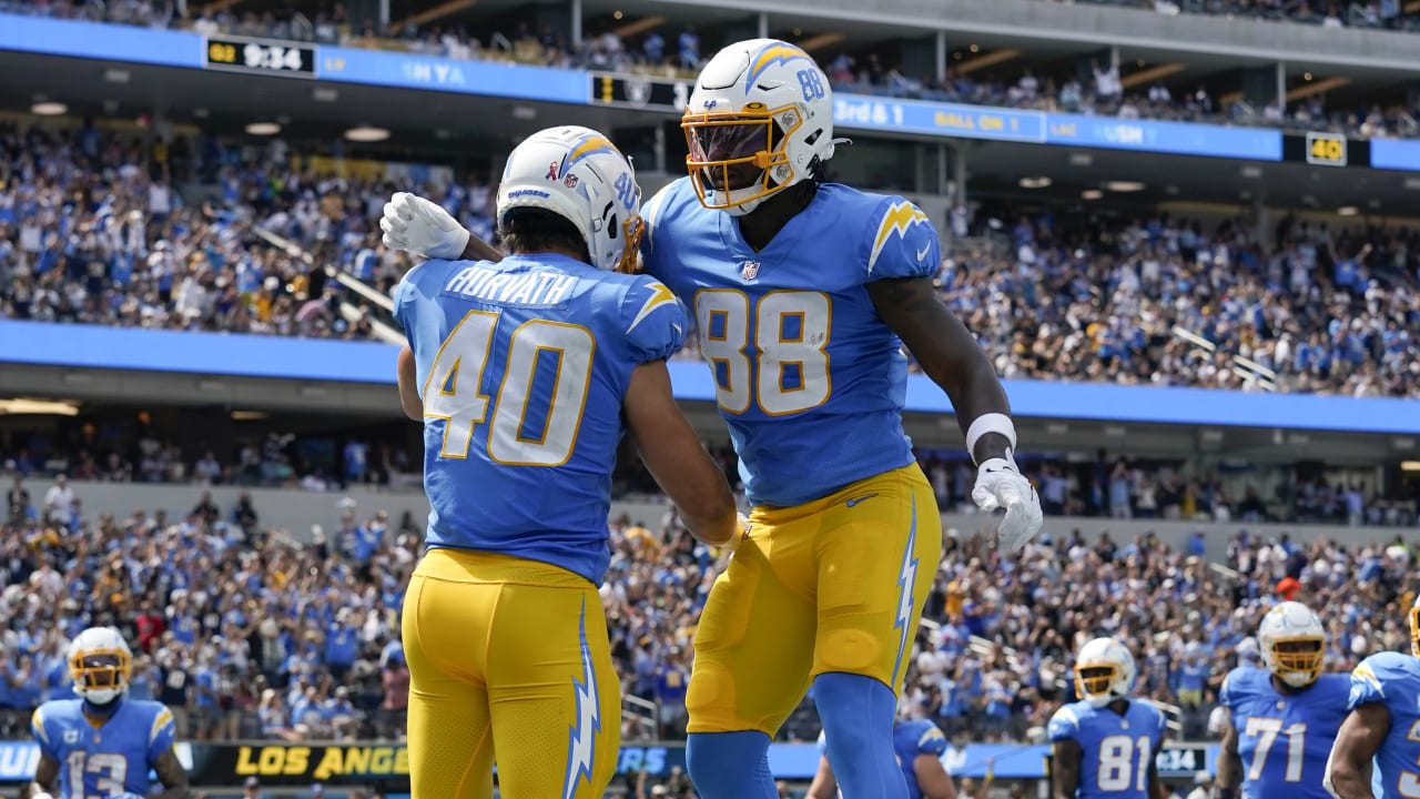 Los Angeles Chargers quarterback Justin Herbert lofts a play-action ...