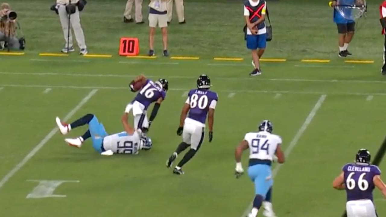 Tennessee Titans linebacker Rashad Weaver sheds a Baltimore Ravens ...