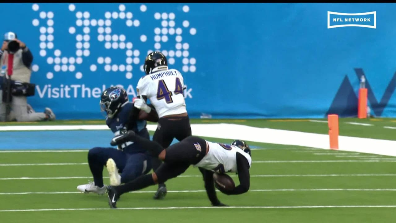 Baltimore Ravens defensive back Geno Stone soars in front of receiver ...