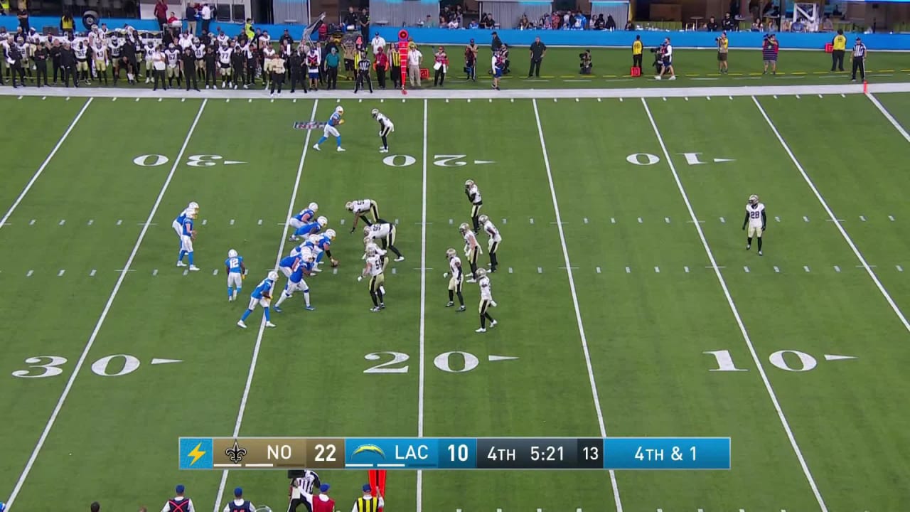 Los Angeles Chargers quarterback Easton Stick converts the first down ...