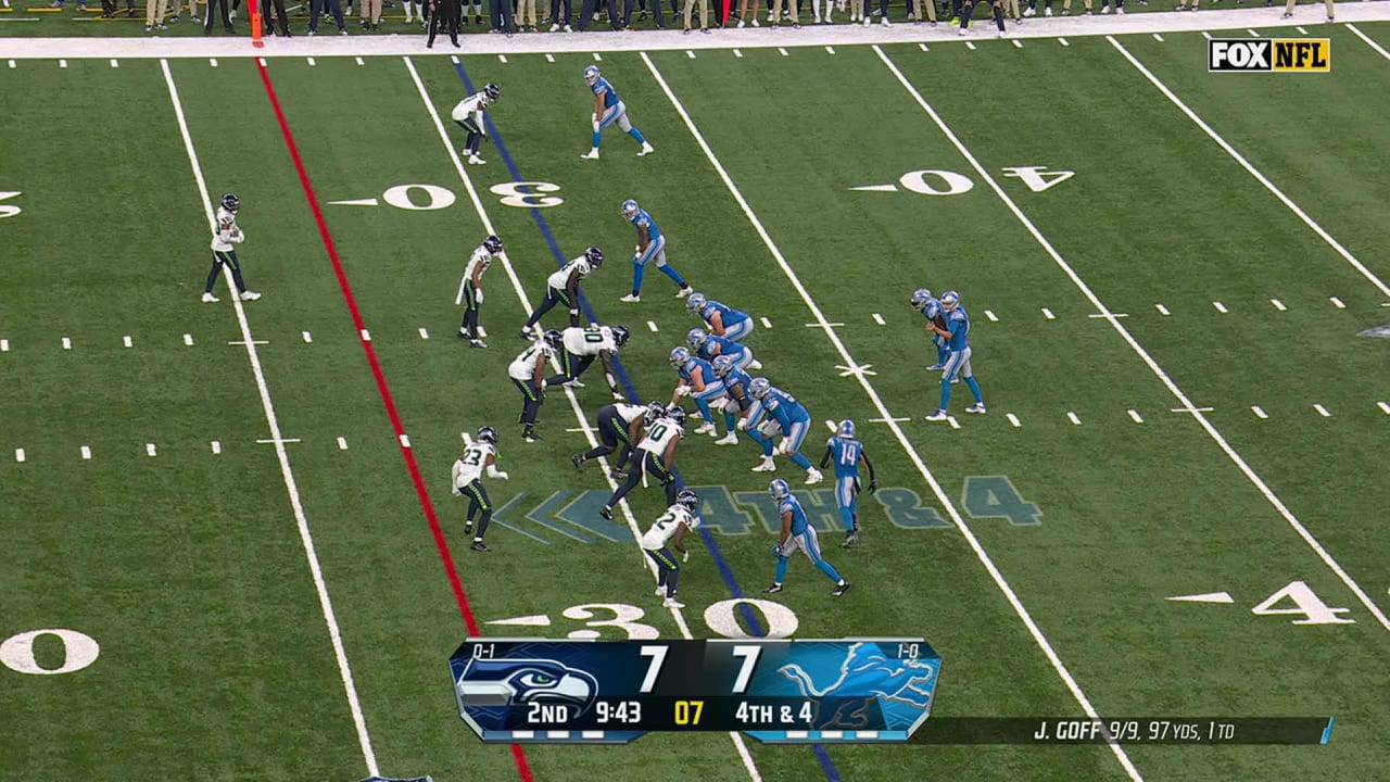 Seattle Seahawks cornerback Devon Witherspoon bats away Jared Goff's fourth-down pass for ...