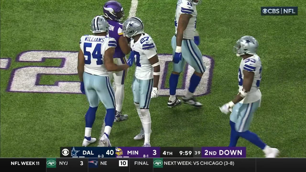 Dallas Cowboys defensive end Sam Williams takes Minnesota Vikings running back Alexander ...