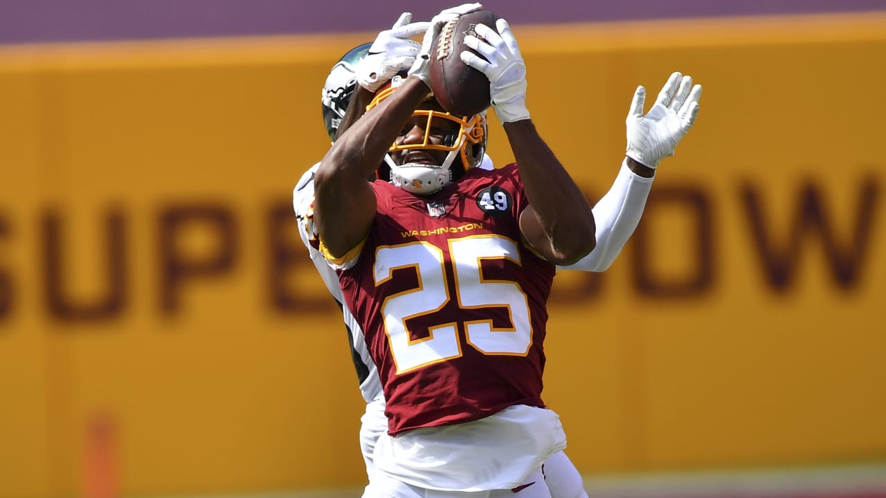 Washington Football Team defensive back Fabian Moreau swipes ...