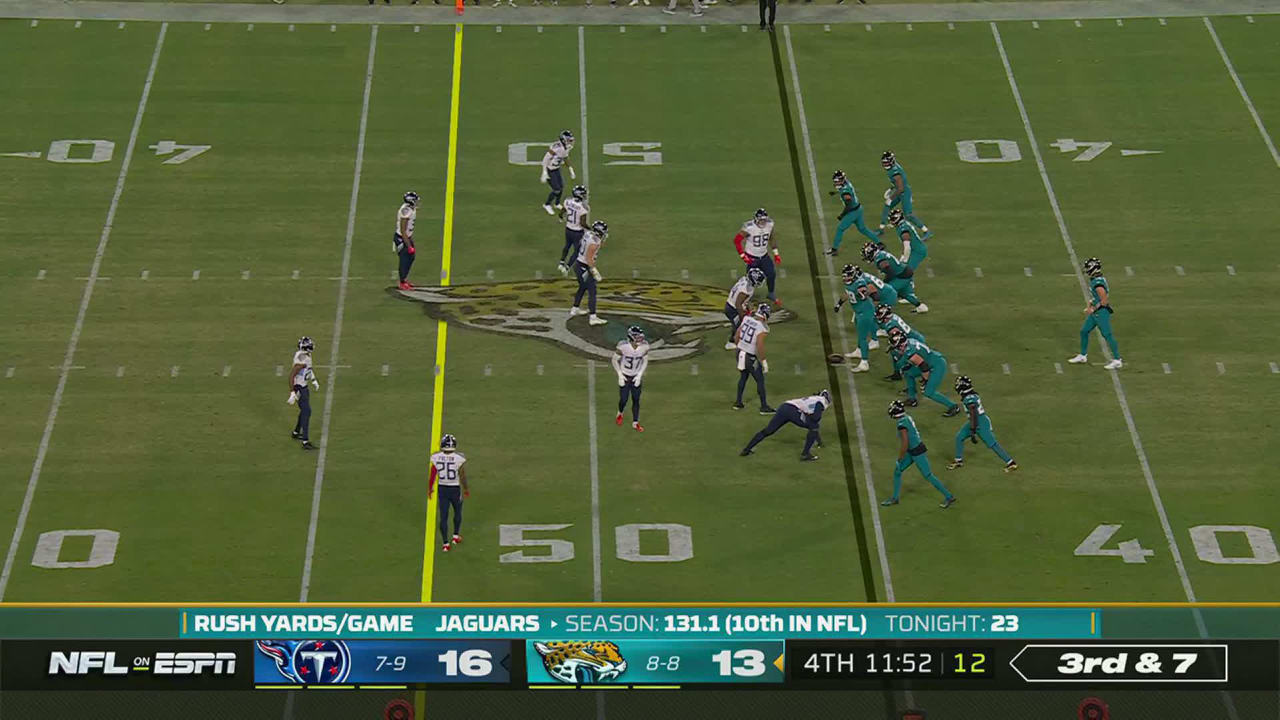 Tennessee Titans linebacker Rashad Weaver swats Trevor Lawrence's pass ...