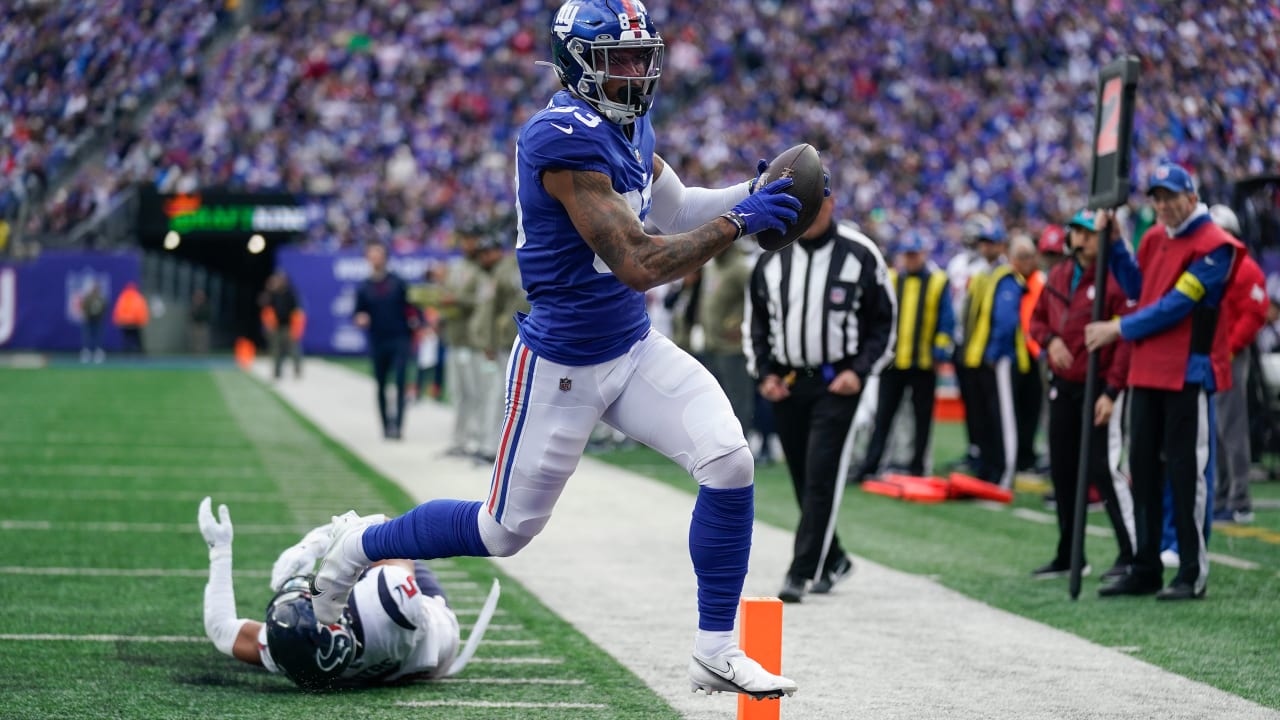 New York Giants tight end Lawrence Cager races toward left pylon for ...