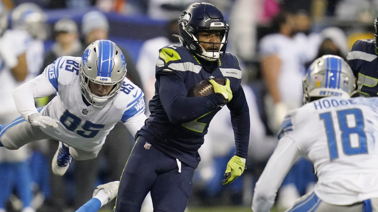 Seattle Seahawks defensive back D.J. Reed tips and picks pass for INT