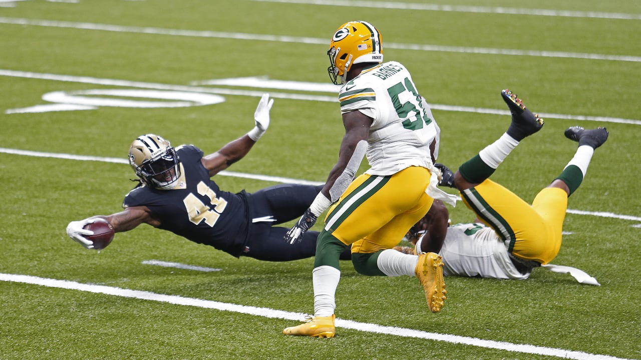 New Orleans Saints running back Alvin Kamara stretches across goal line ...