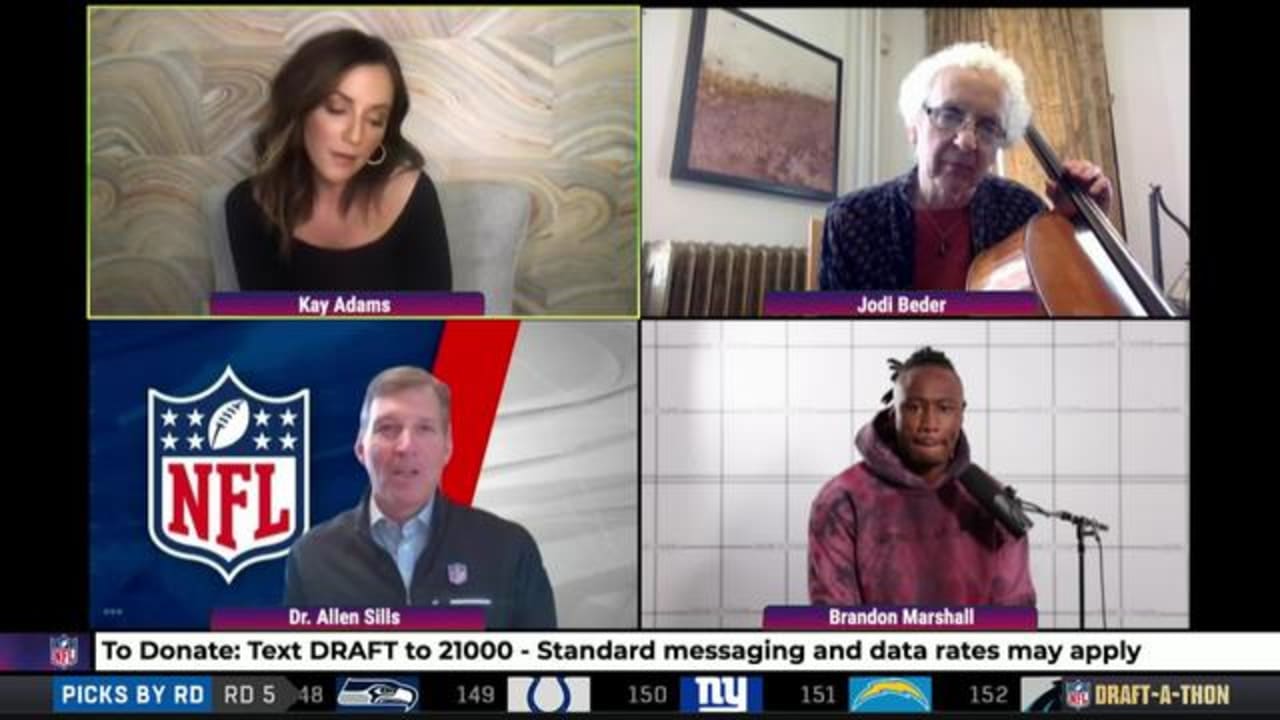 Brandon Marshall gets suggestions from Dr. Allen Sills on how to stay ...