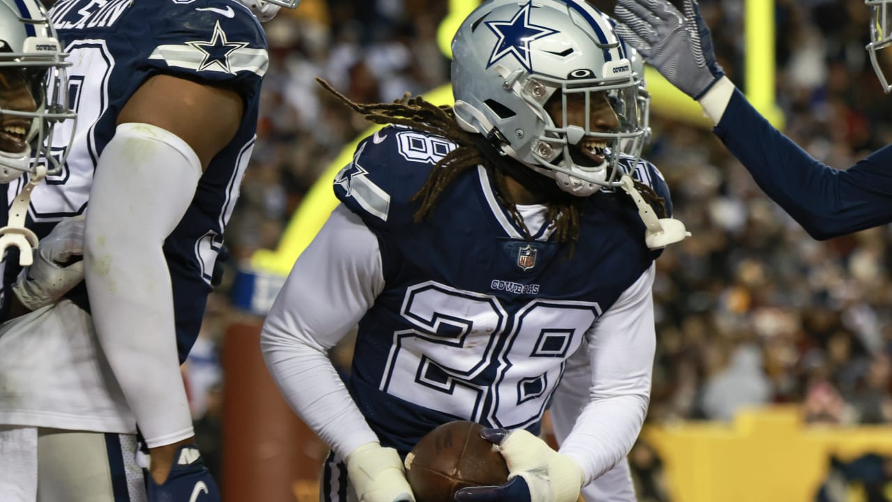 Dallas Cowboys safety Malik Hooker climbs ladder in end zone to secure ...