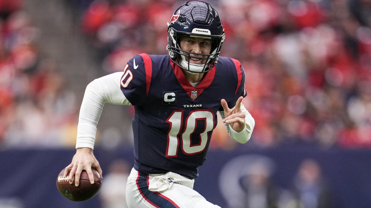 Houston Texans quarterback Davis Mills works around messy pocket before ...