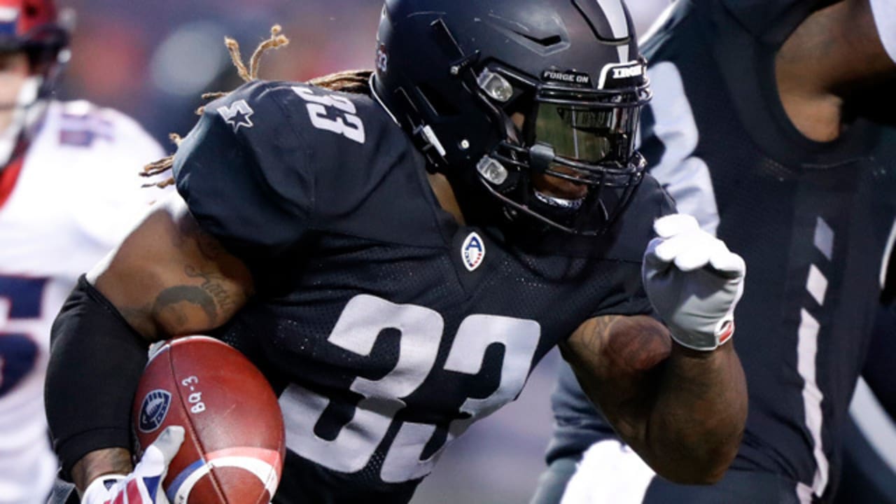 Birmingham Iron running back Trent Richardson goes up the middle for ...