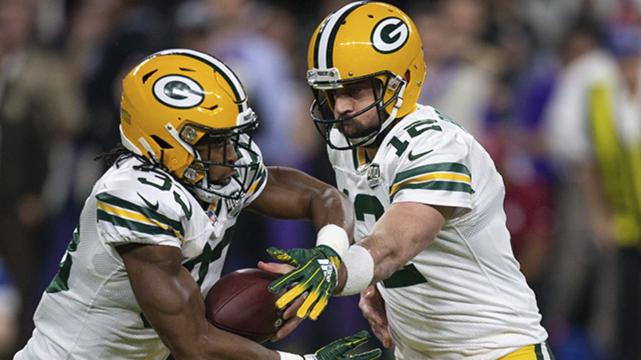 Aaron Jones trucks Everson Griffen in the hole for third-down pickup