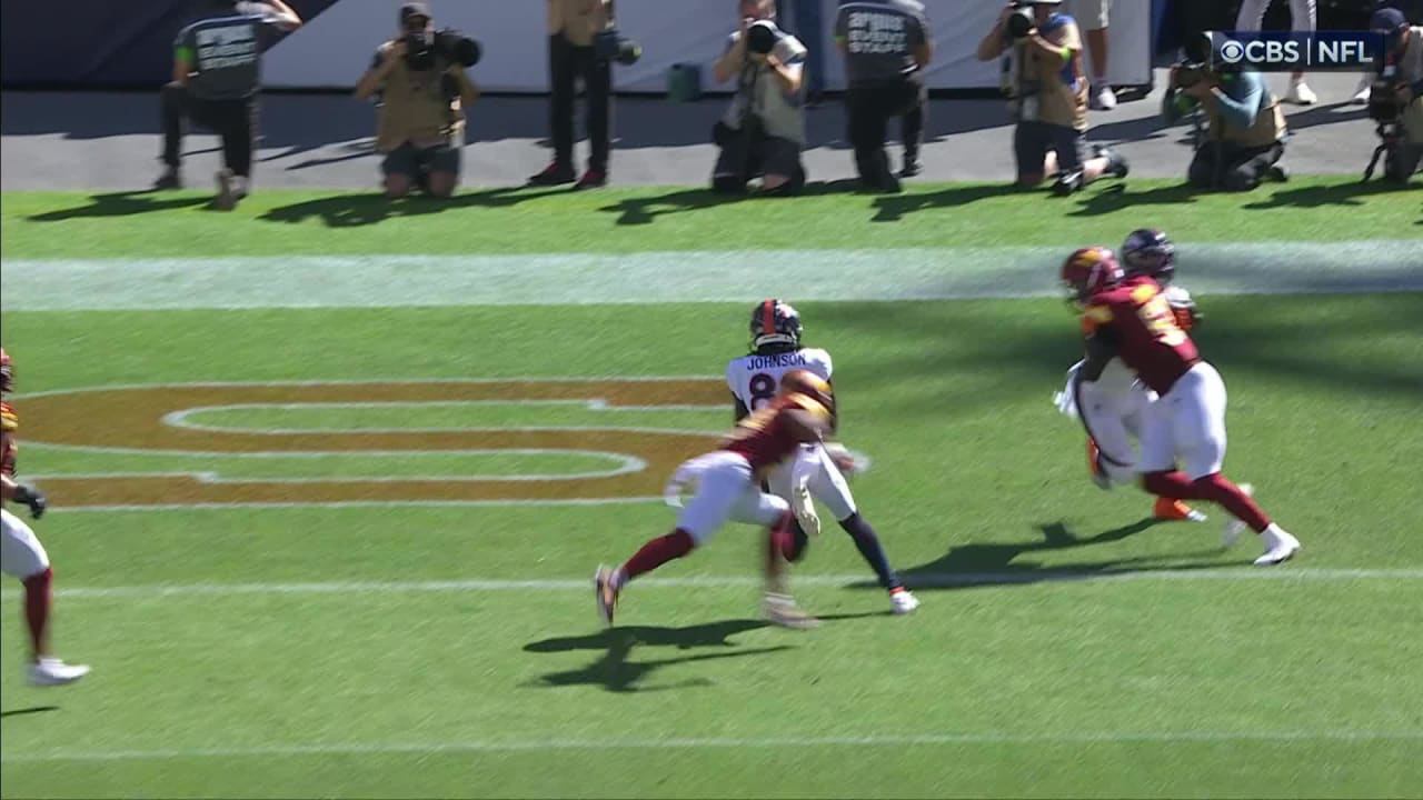 Denver Broncos quarterback Russell Wilson dots wide receiver Brandon ...