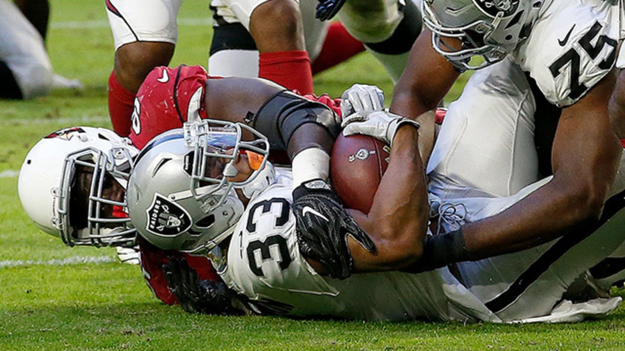 Cards stuff DeAndre Washington on third-and-goal