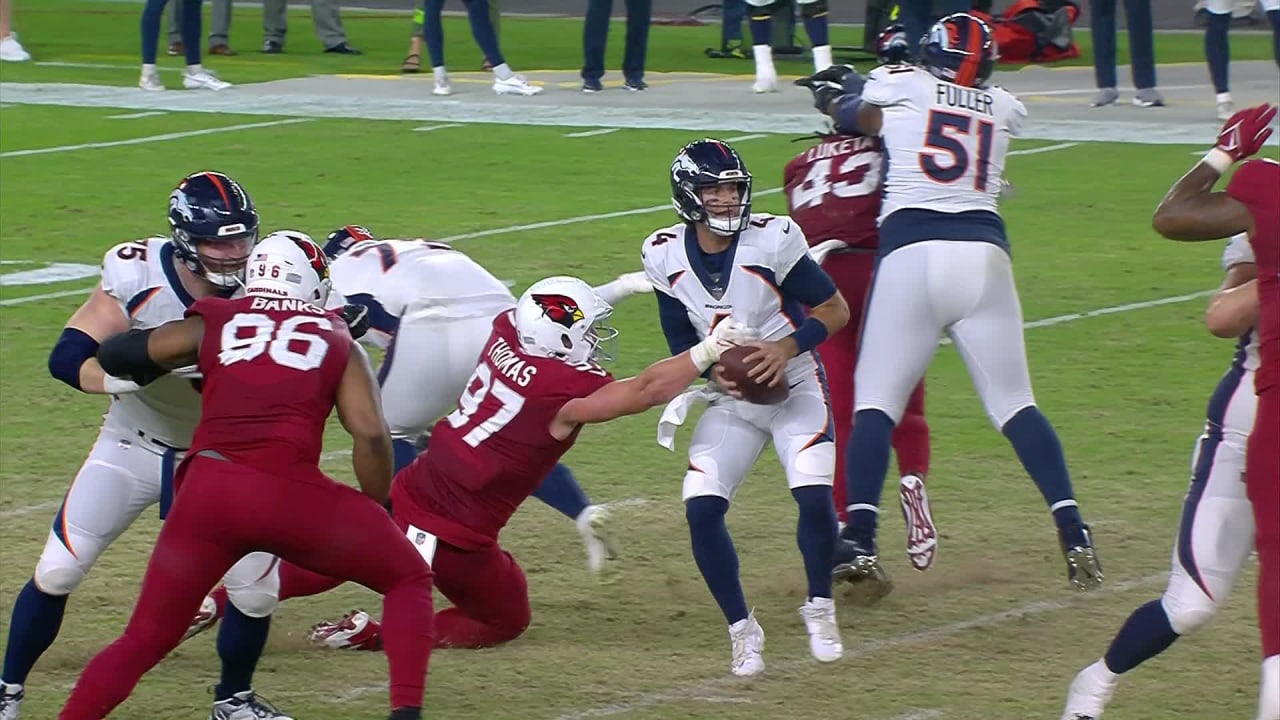 Defensive end Cameron Thomas rips by right tackle for a sack on Broncos ...