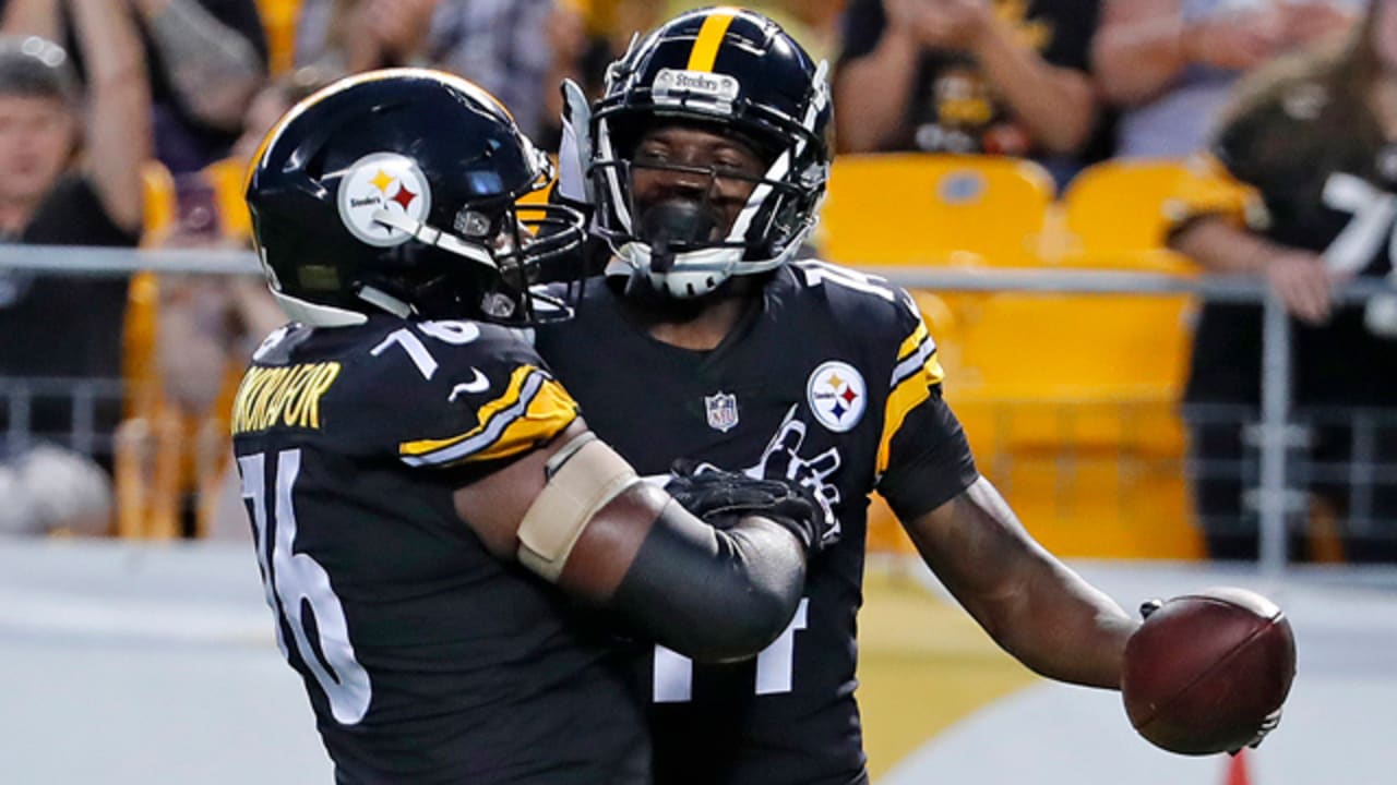 Tevin Jones catches 24-yard TD between three Titans defenders