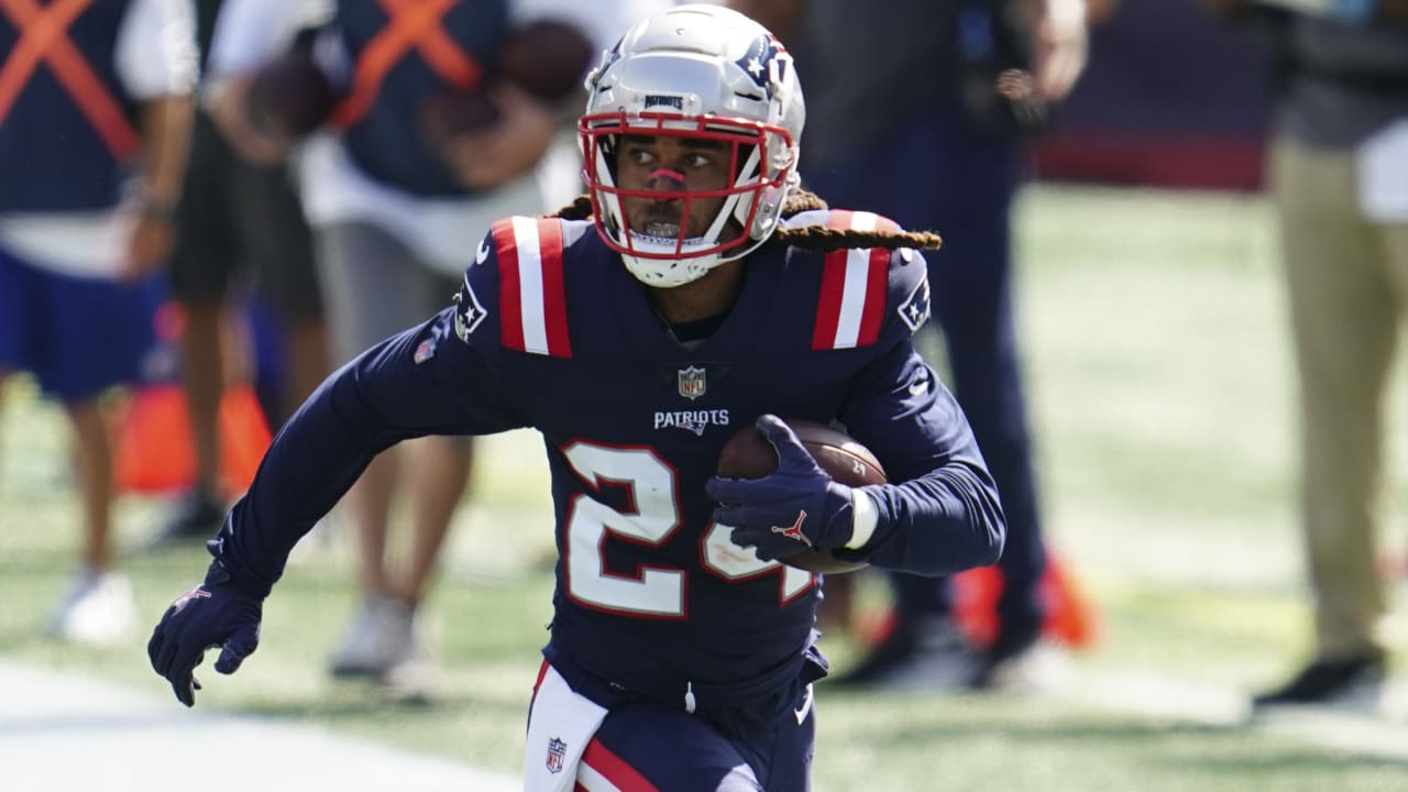 New England Patriots cornerback Stephon Gilmore reads Miami Dolphins ...