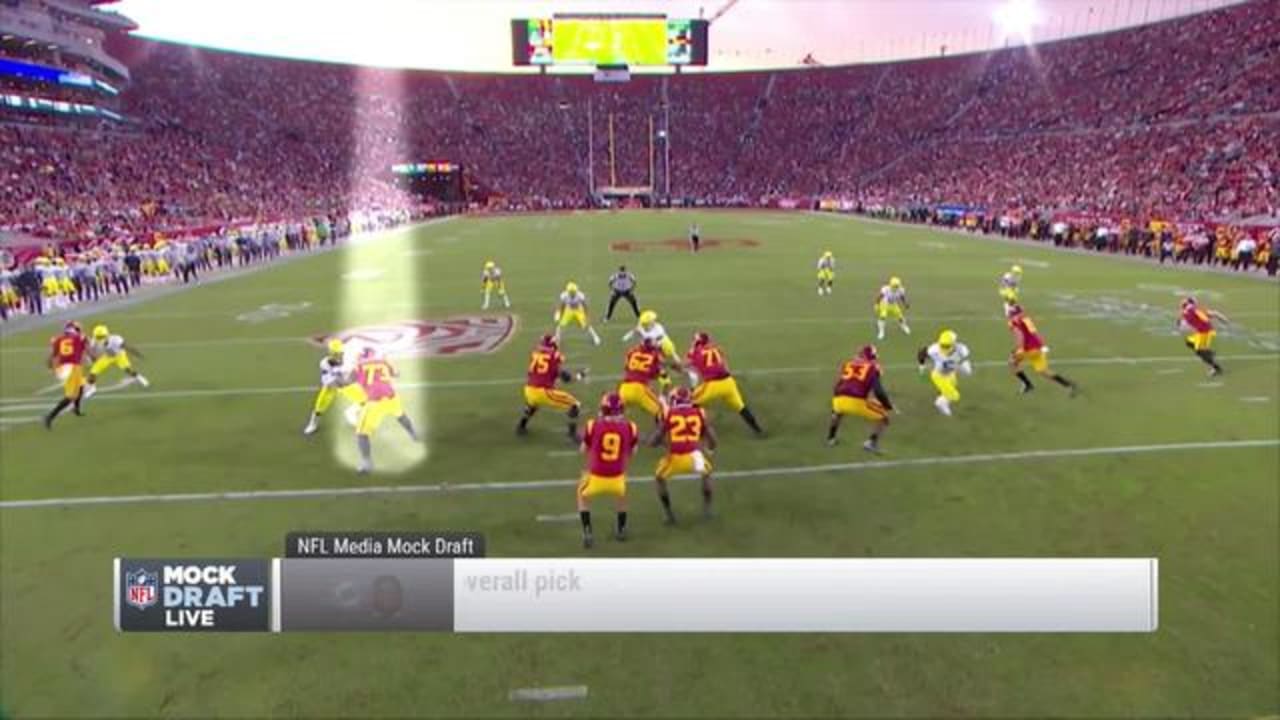 Mike Rob passes on a pass rusher for Seattle at No. 27