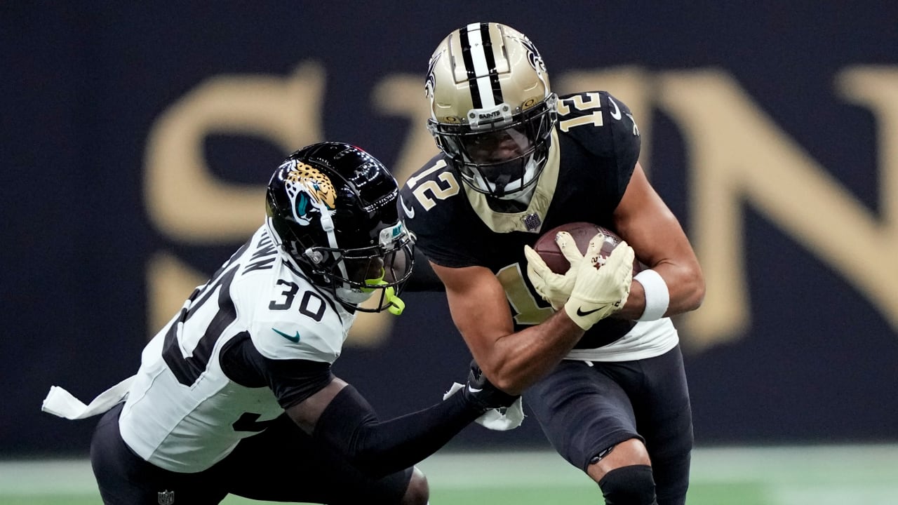 New Orleans Saints wide receiver Chris Olave breaks tackle after first ...