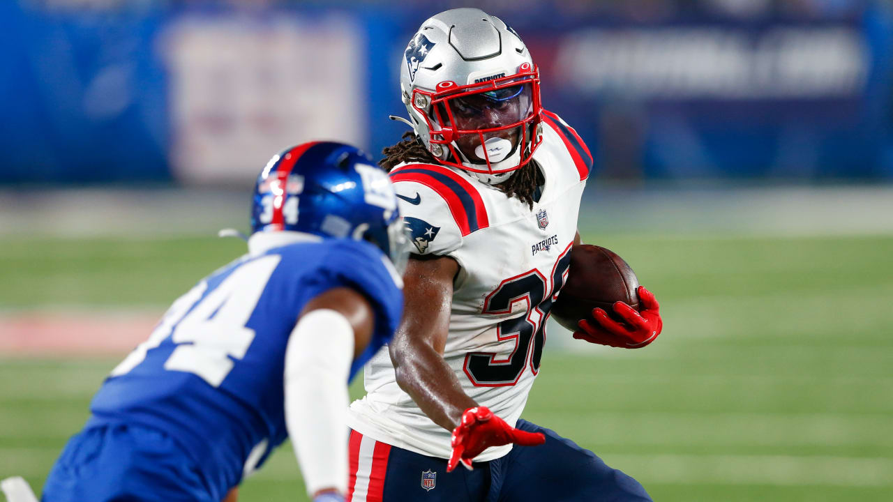 New England Patriots running back Rhamondre Stevenson bulls through New ...