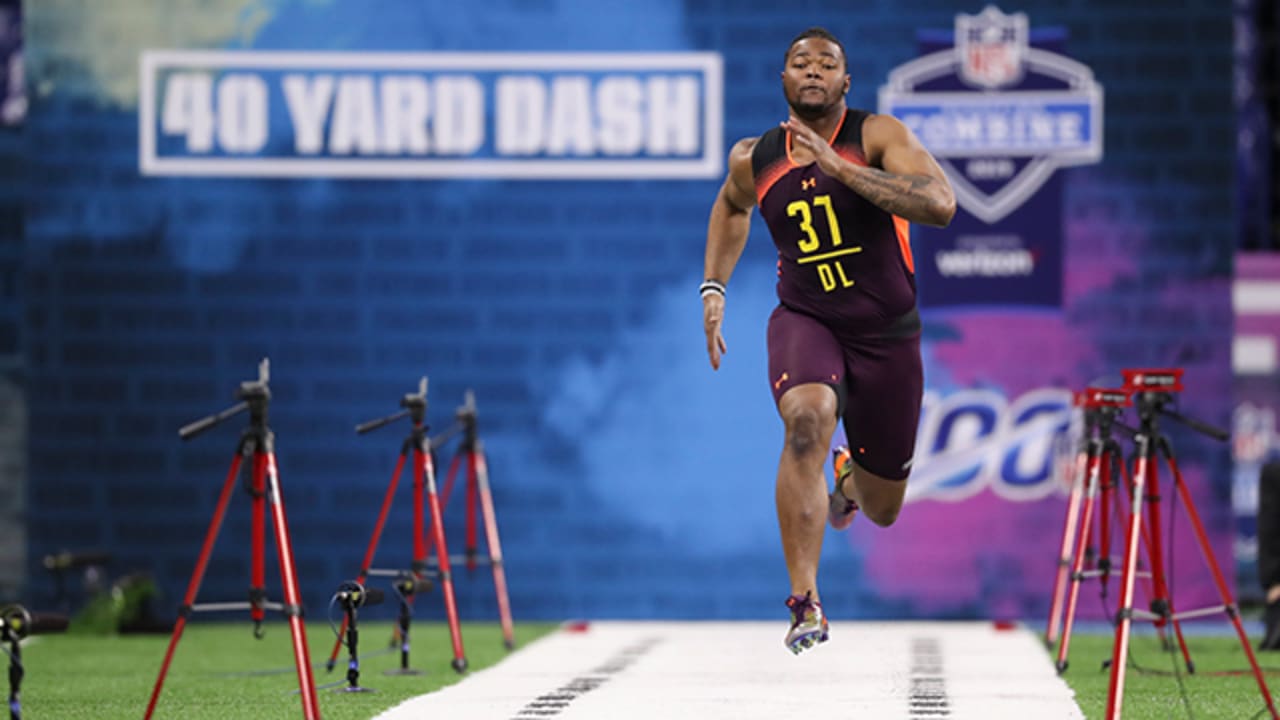 Michigan defensive lineman Rashan Gary runs an official 4.58 40-yard ...